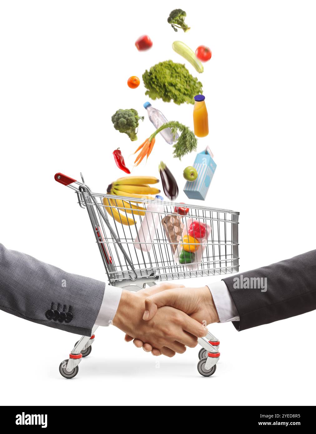 Businessmen shaking hands in front of a shopping cart with falling ...