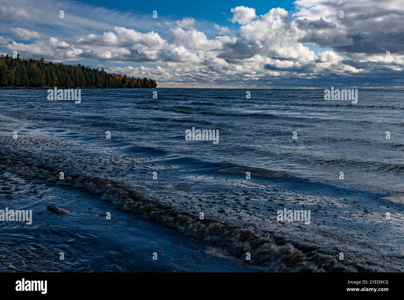 Clouds cover the sky over Lake Michigan's Newport Bay at Newport State ...
