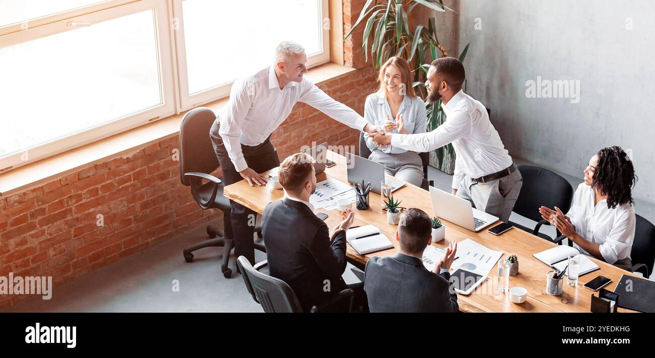 Corporate Meeting, Boss Shaking Hands With Employee Sitting In Office ...