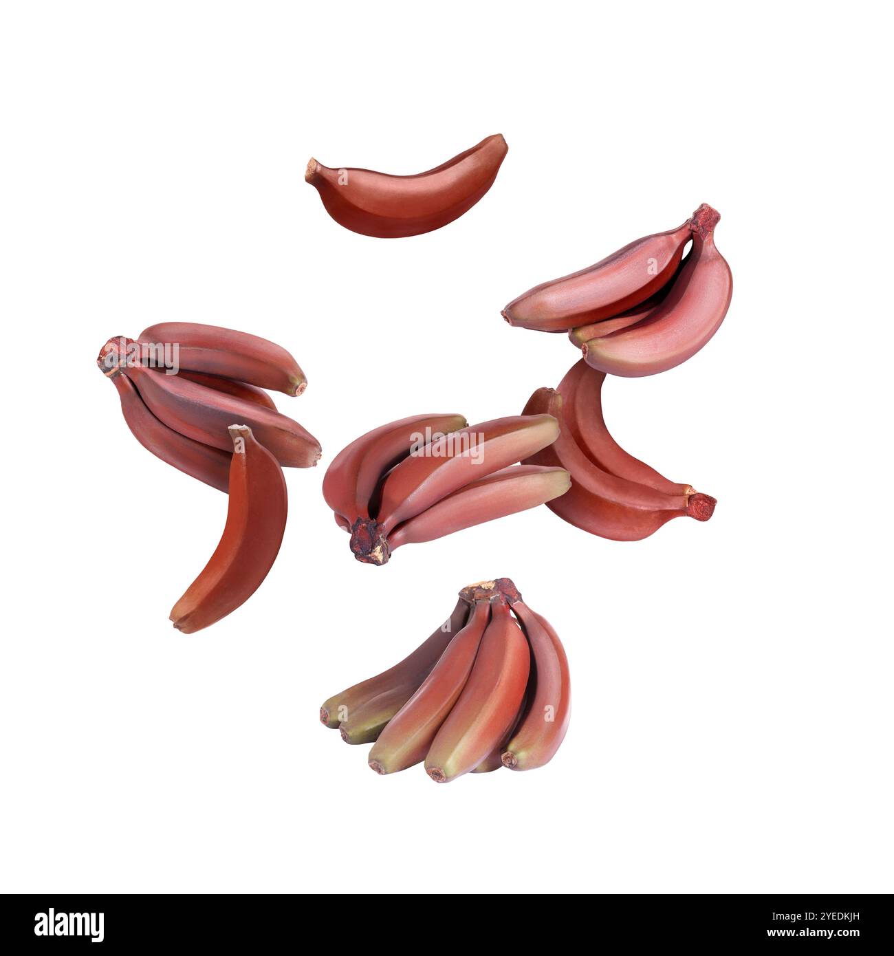 Red baby bananas in air on white background Stock Photo - Alamy