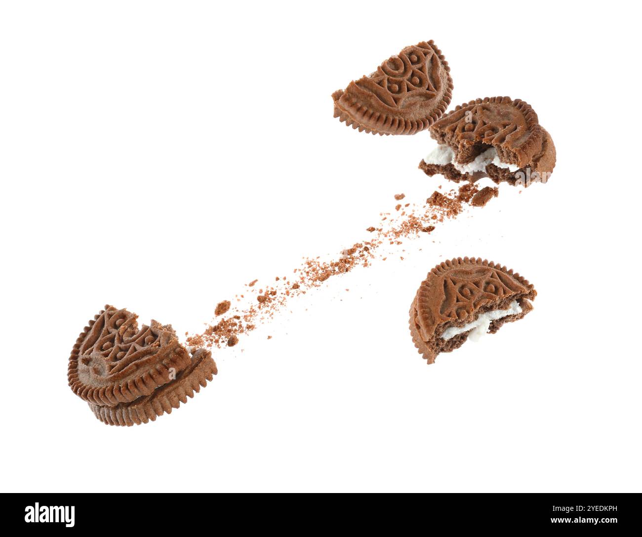 Tasty broken sandwich cookies in air on white background Stock Photo ...