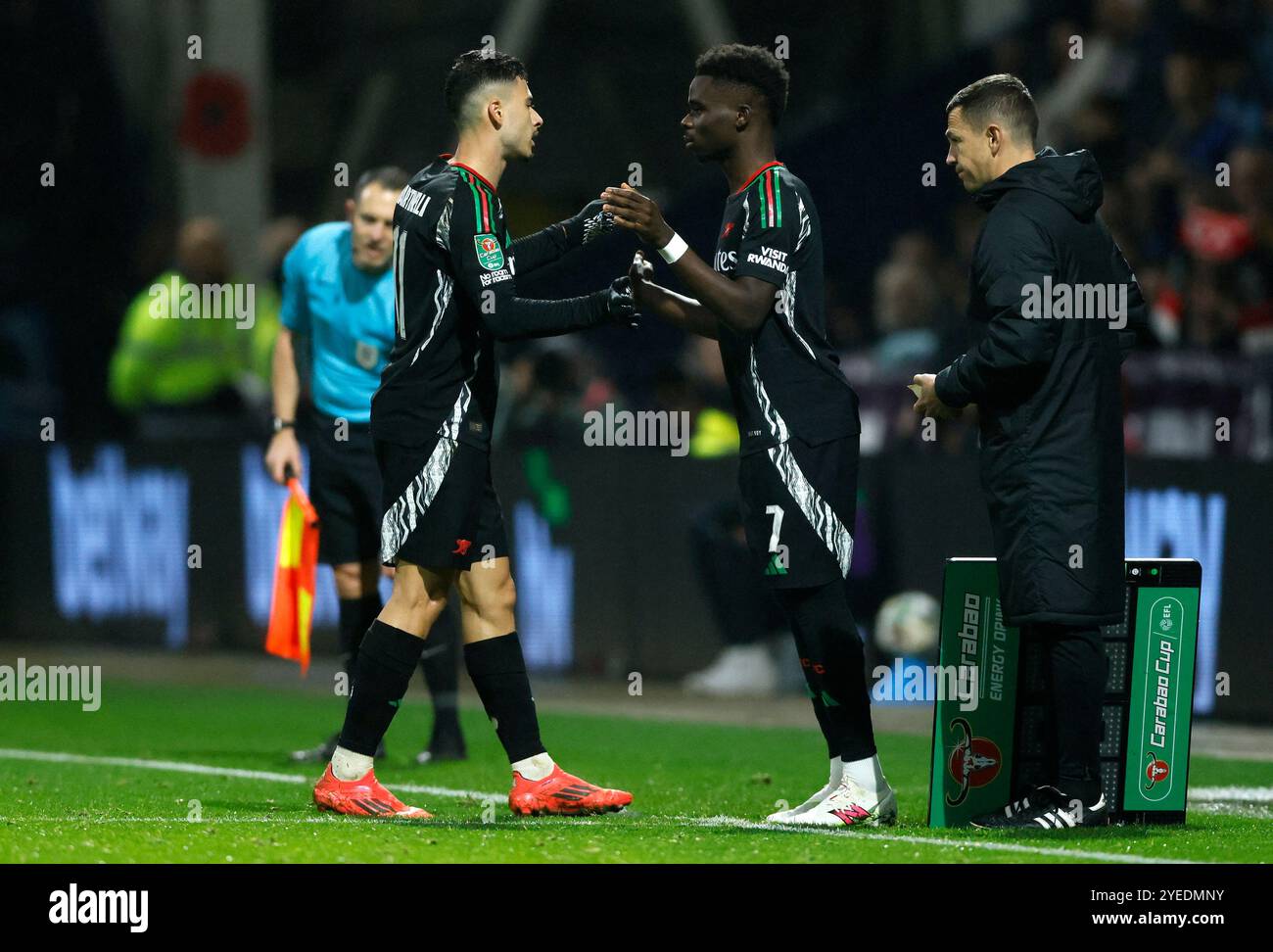 Arsenal's Gabriel Martinelli (left) is substituted off for team-mate ...