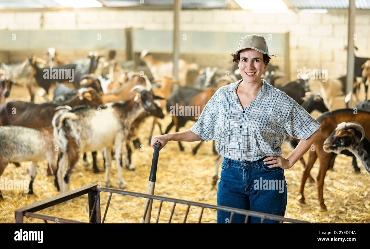Portrait of latino woman owner of goat farm Stock Photo - Alamy