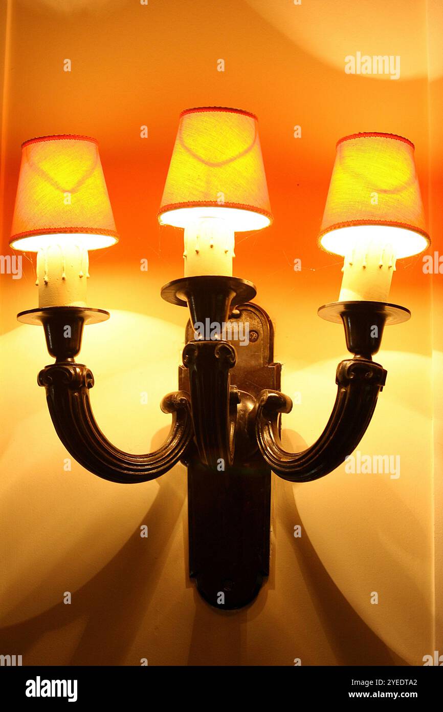 antique lamp post on wall Stock Photo - Alamy