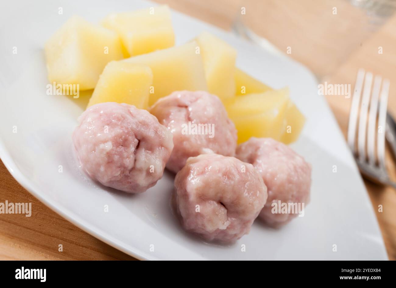 Steamed meatballs with potatoes Stock Photo - Alamy