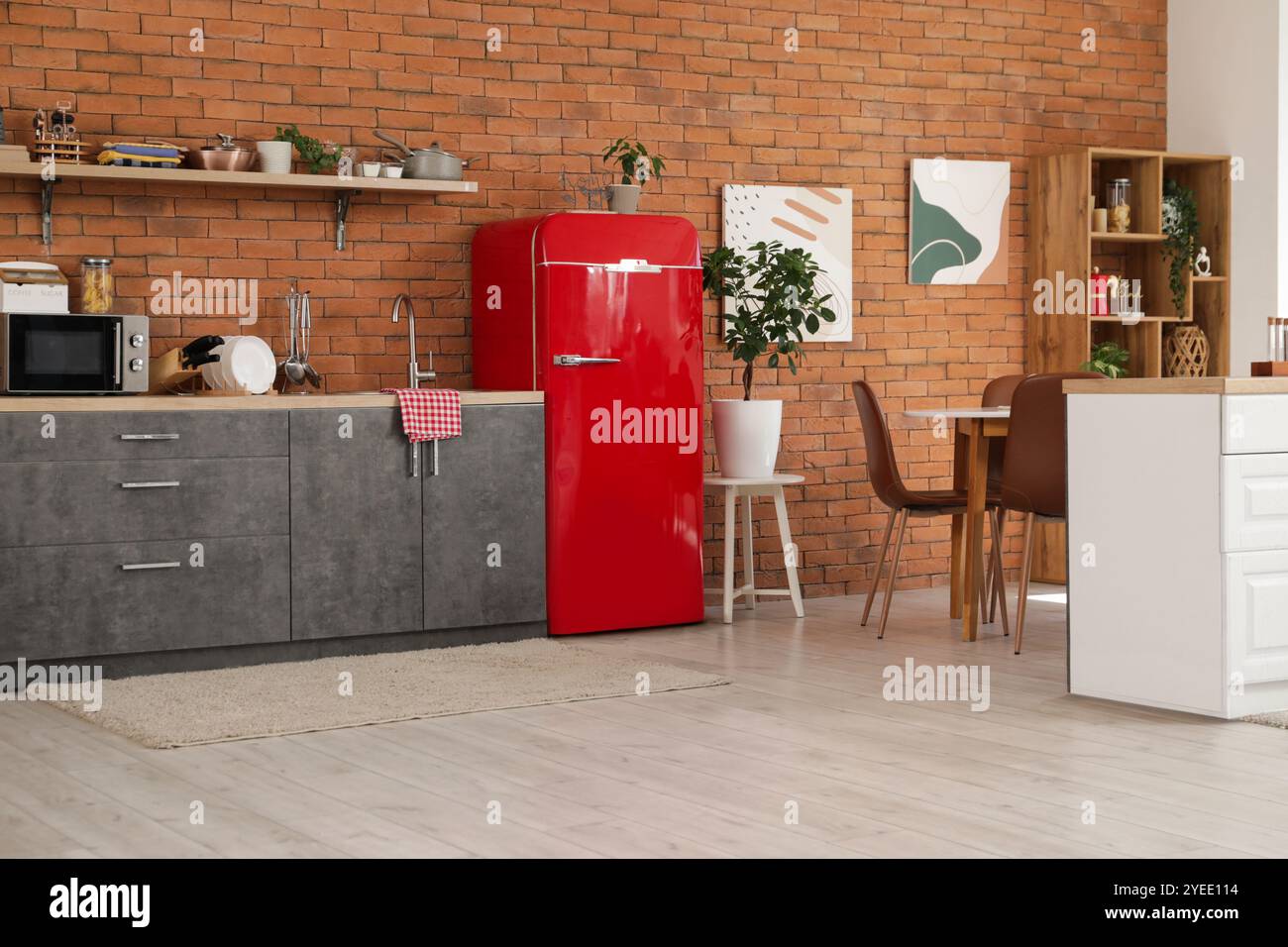 Interior of modern kitchen with red fridge, counters and shelf Stock ...