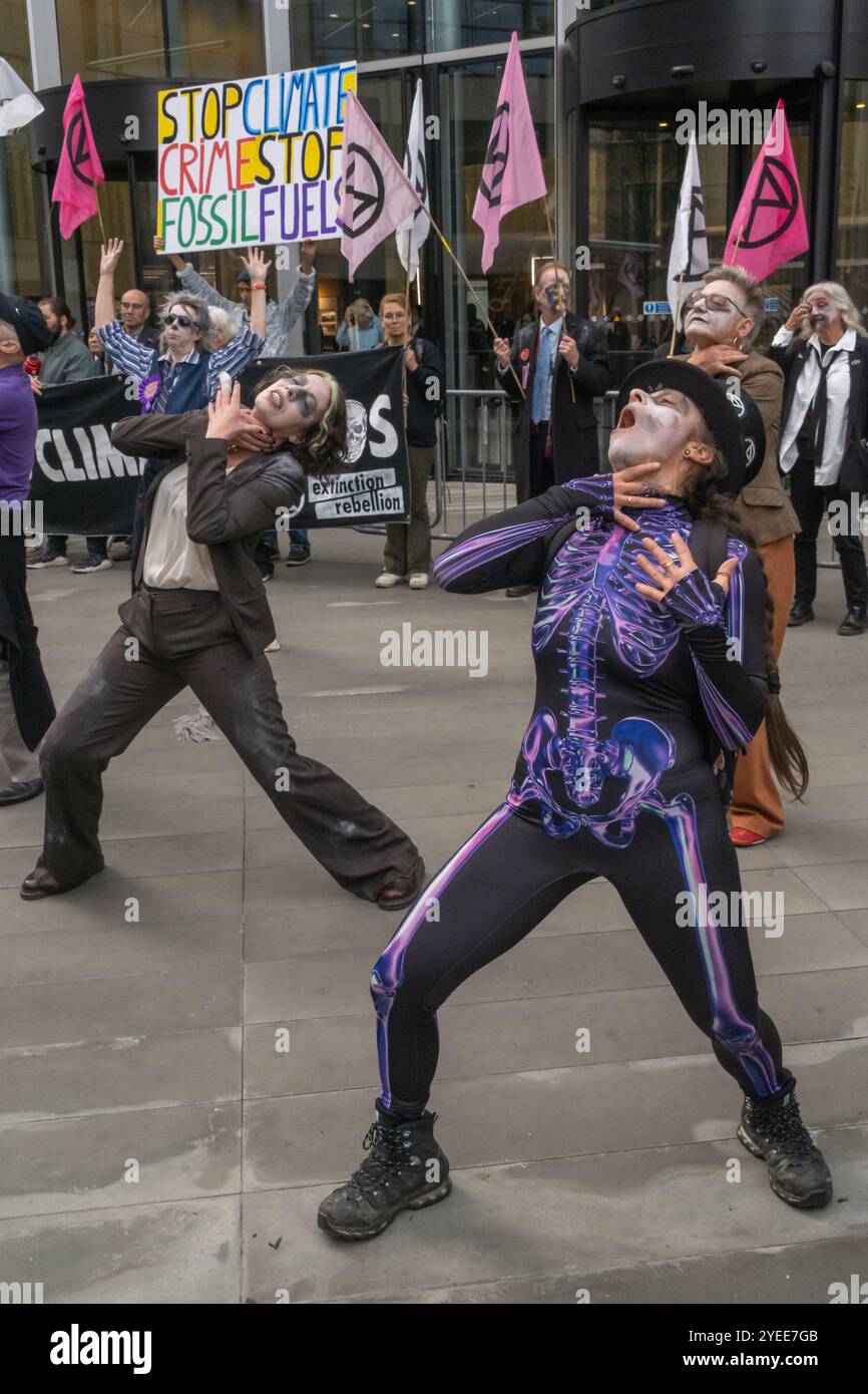 London, UK. 30 Oct 2024. Zombies dance at insurers MarshMcLennan ...