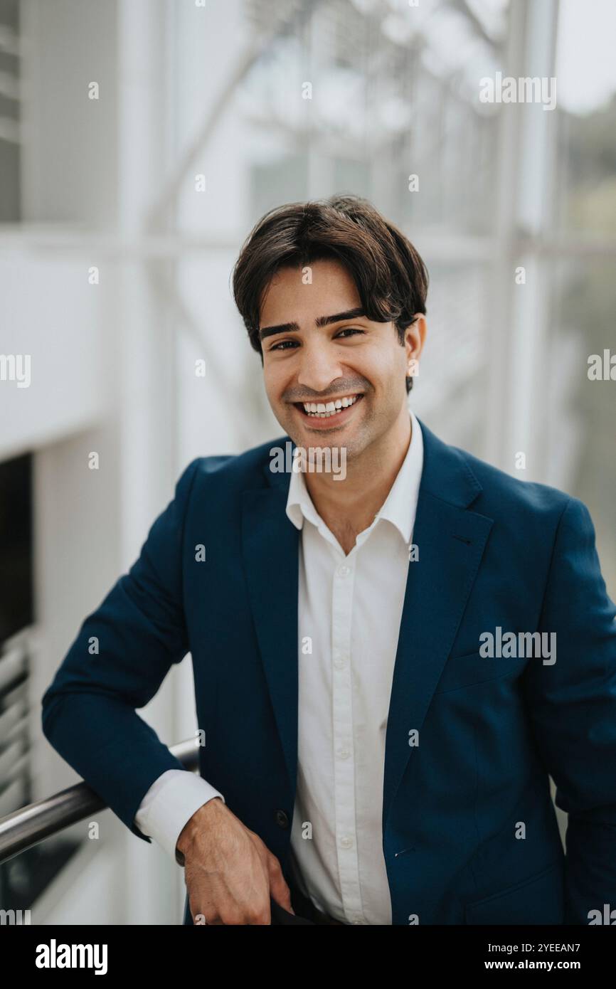 Young businessman standing front hi-res stock photography and images ...