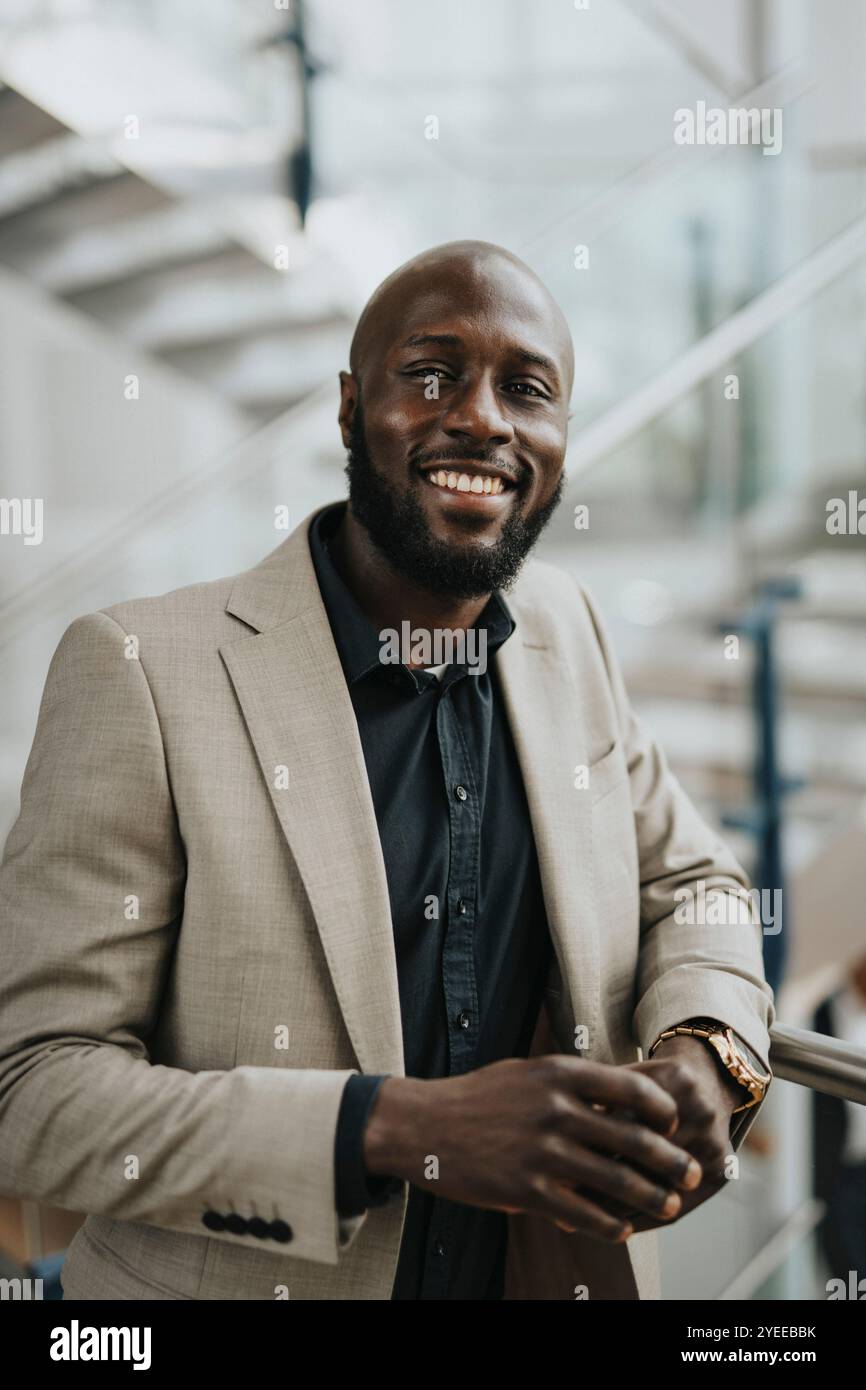 Portrait happy bald businessman hi-res stock photography and images - Alamy