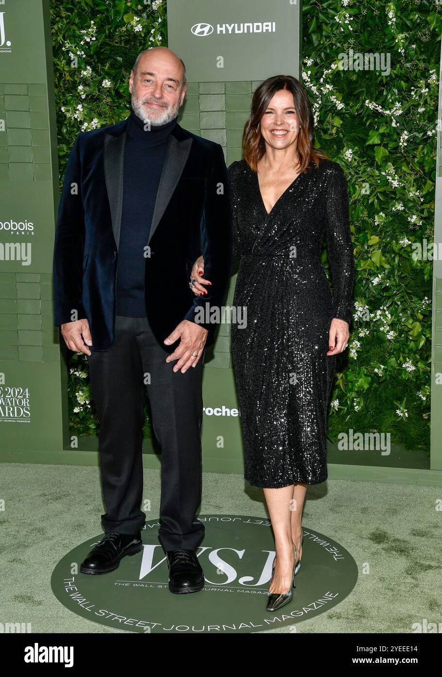 Peter Howarth, left, and Emma Tucker attend the WSJ. Magazine ...