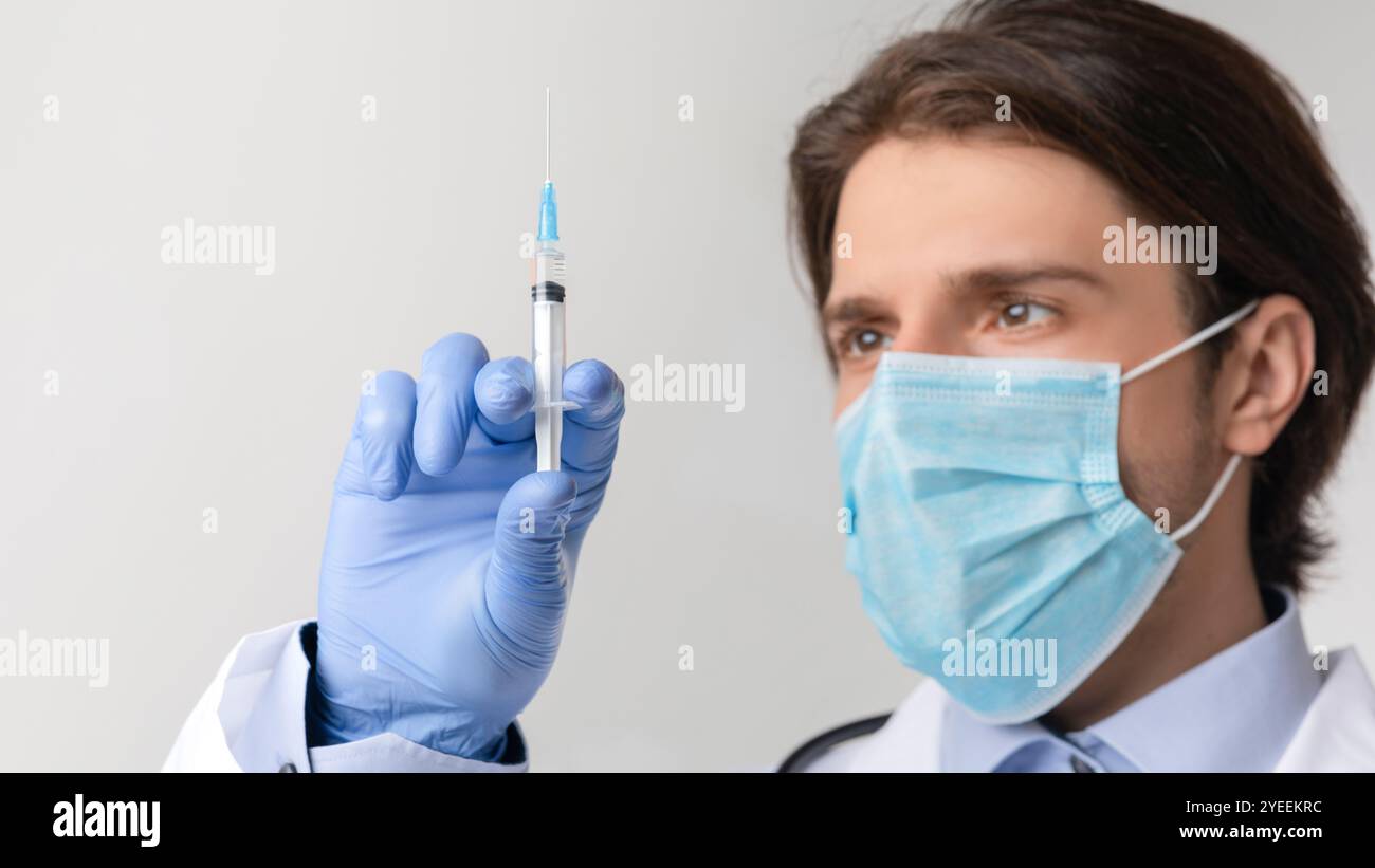 Mandatory Vaccination Concept. Closeup Of Male Doctor Holding Syringe ...