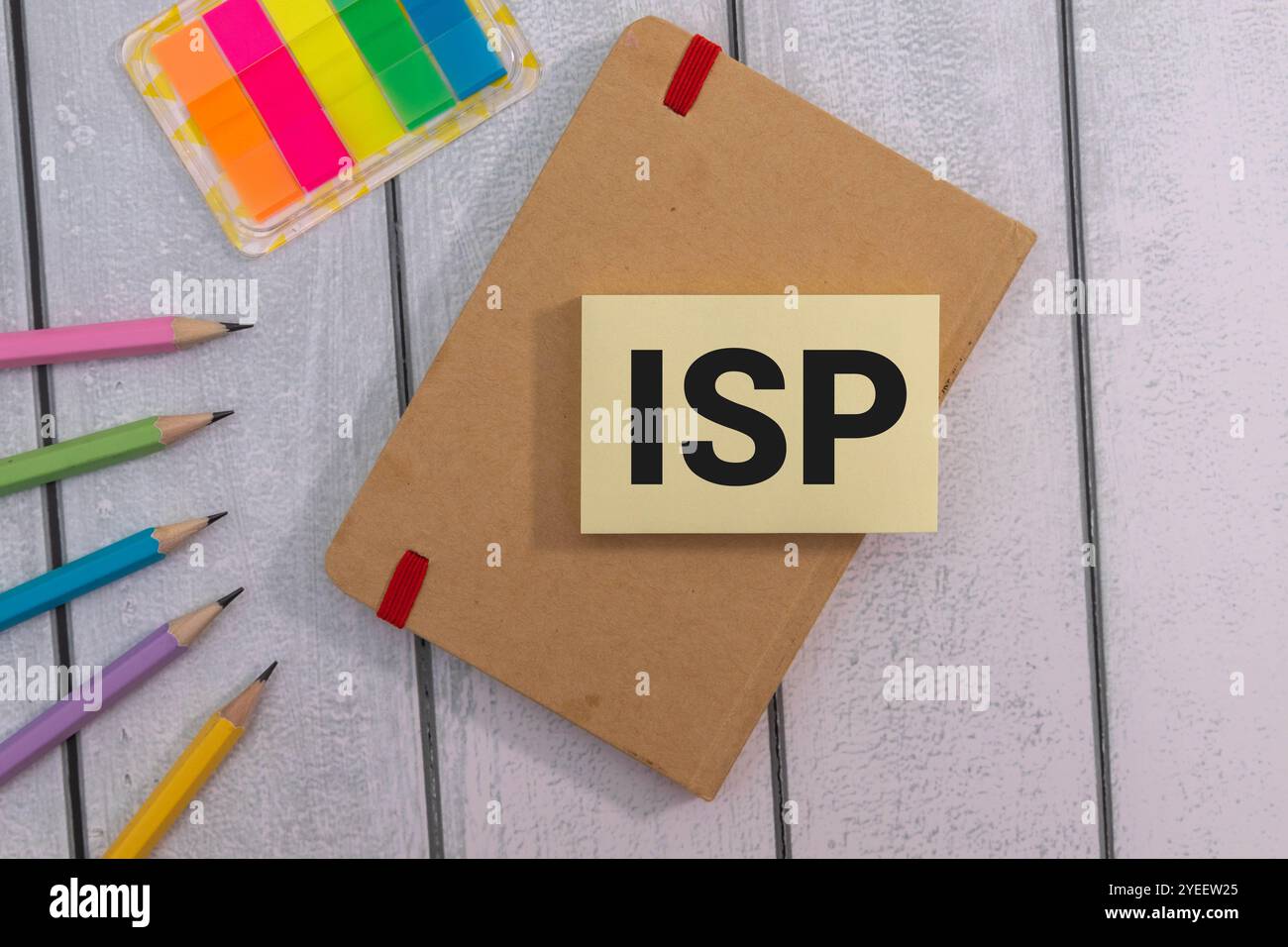 ISP text written on notepad on the blue background Stock Photo - Alamy