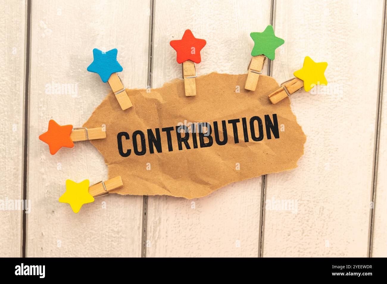 Business concept. On a green surface are coins and dollars in a bundle ...