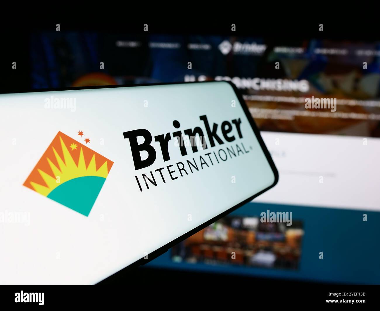 In this photo illustration, a mobile phone with the logo of American ...