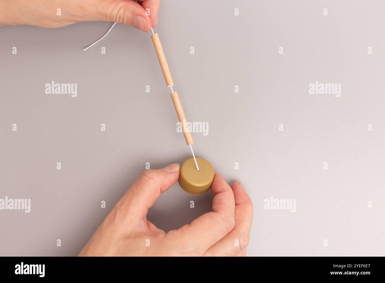 Crafting reindeer puppet leg with cardboard tube string bottle caps ...