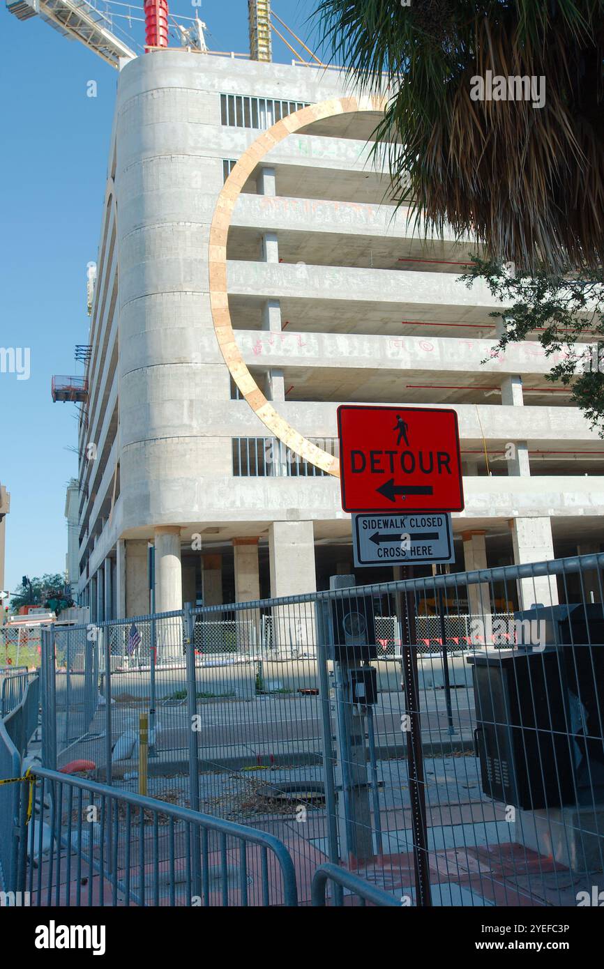Multi story concrete Parking Garage under construction with a plywood ...