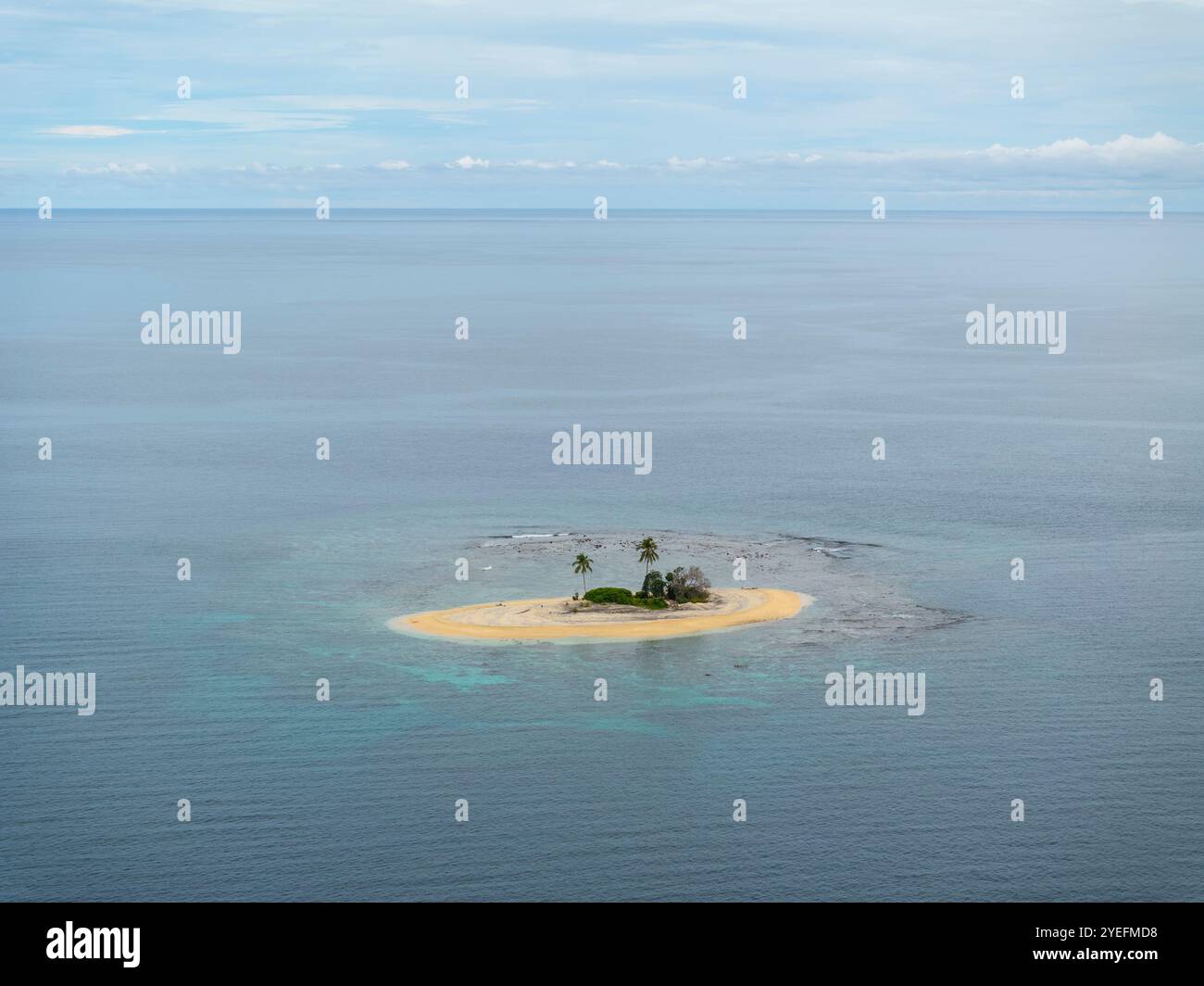 Tiny Tropical Island surrounded by open water Stock Photo - Alamy