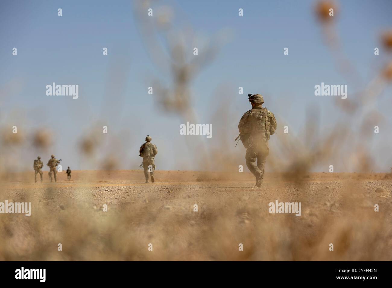 A squad of U.S. Army Soldiers move during a training mission in support ...