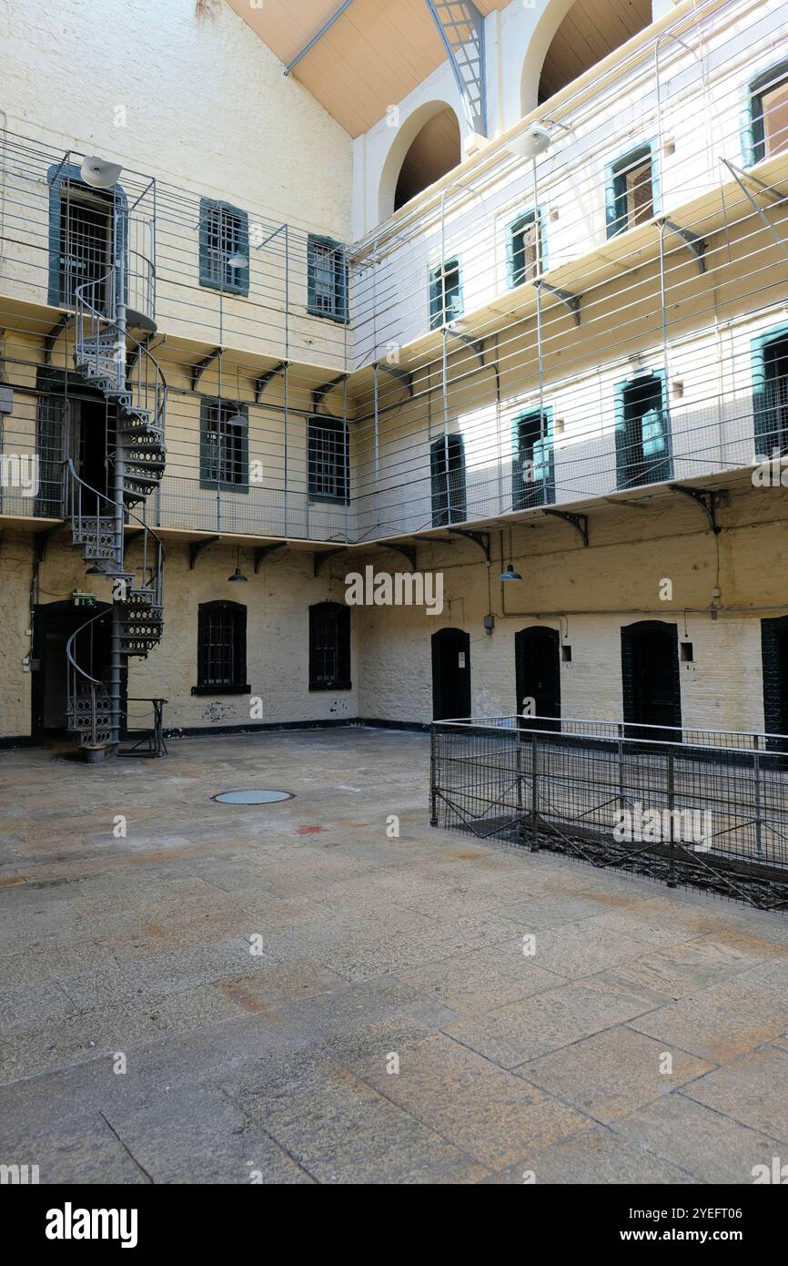 Spiral metal stairway and upper floors seen from the main hall at ...
