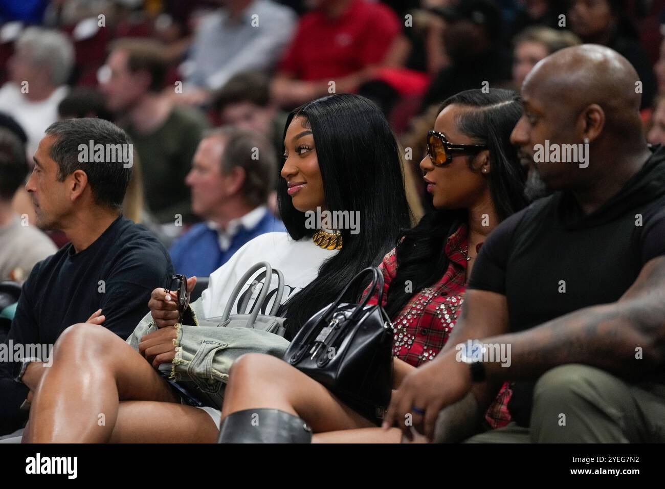 Angel Reese of the WNBA's Chicago Sky sits courtside during the first ...