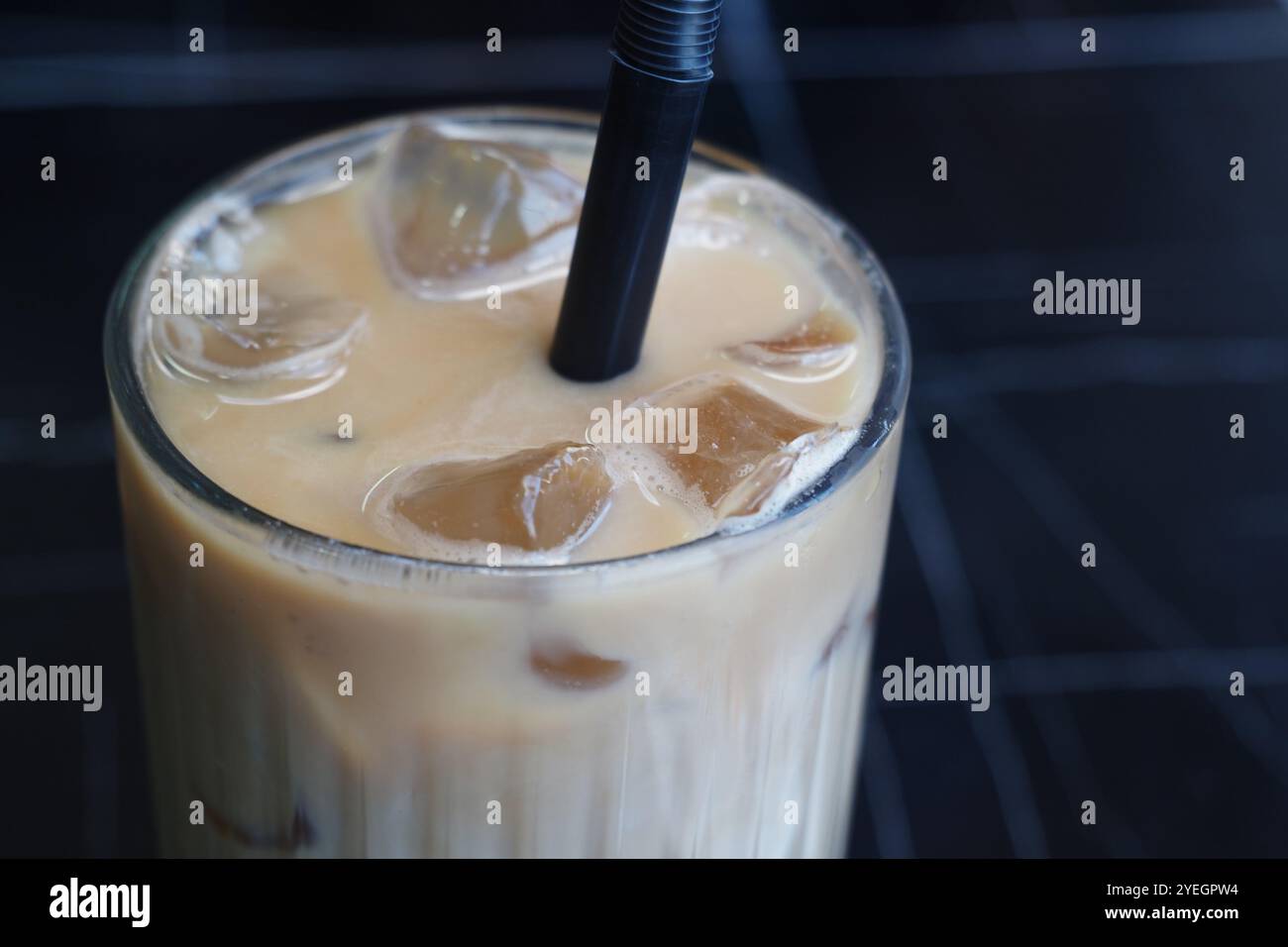 Enjoy a Refreshing Iced Coffee, complete with Ice Cubes in a Clear Glass for your delight Stock ...