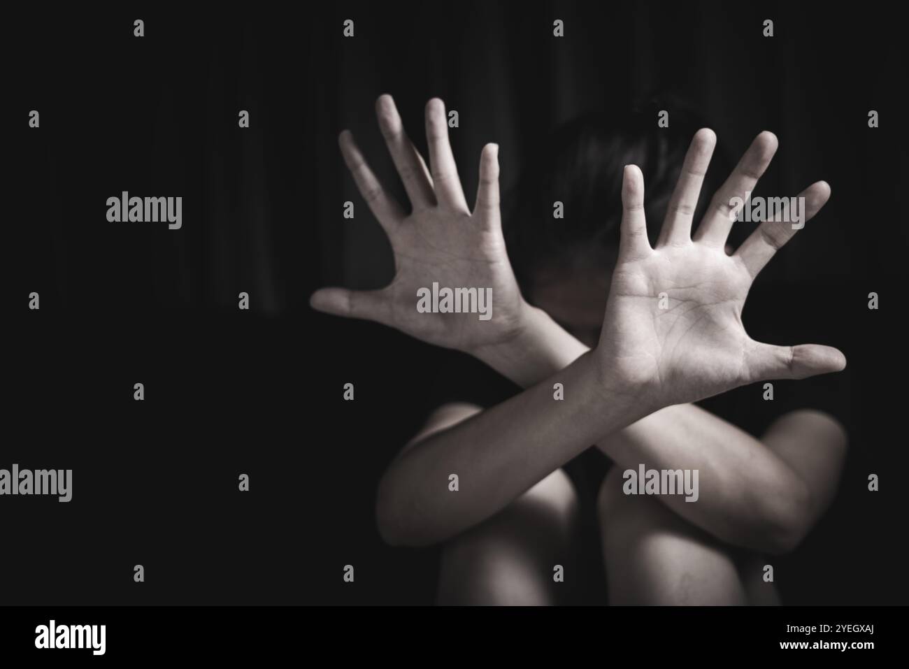 Close up of woman showing stop gesture with hand blurred background ...