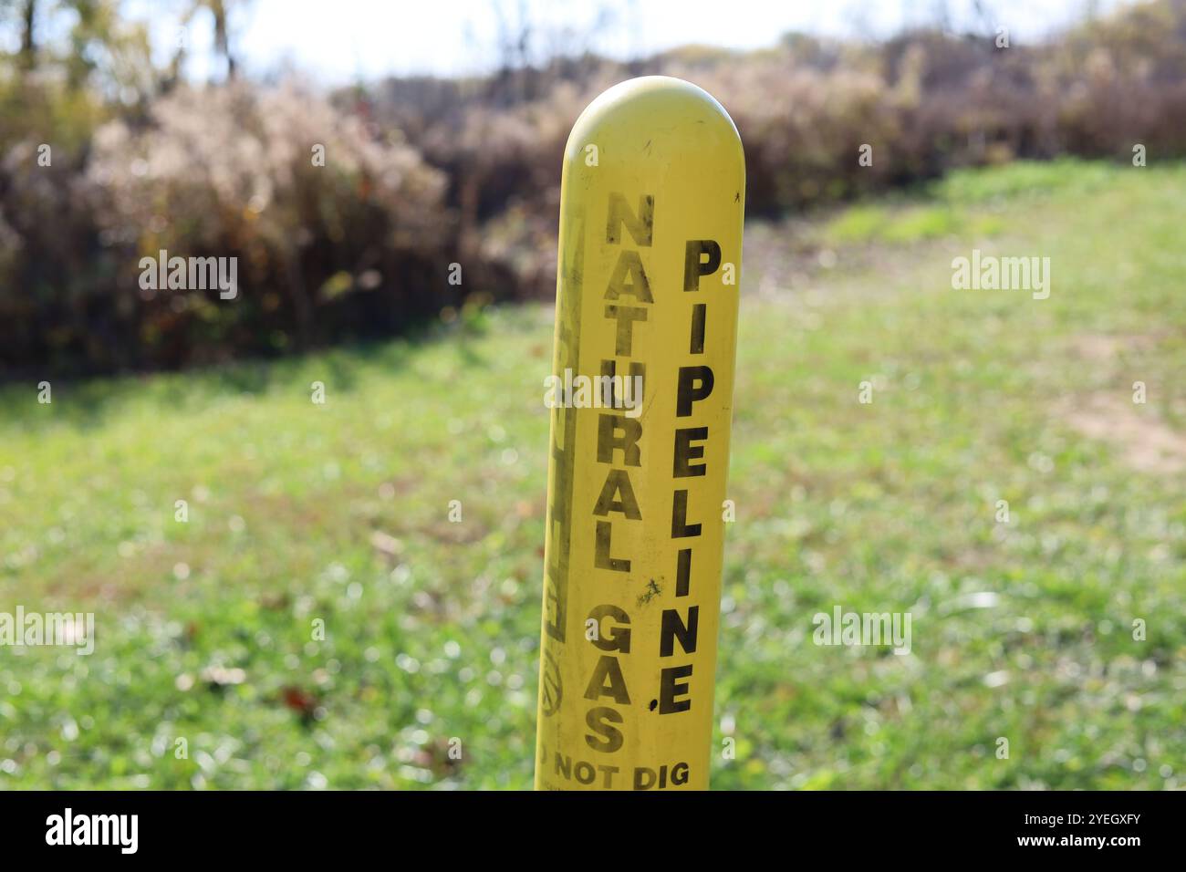 Natural gas pipeline indicator pole Stock Photo - Alamy
