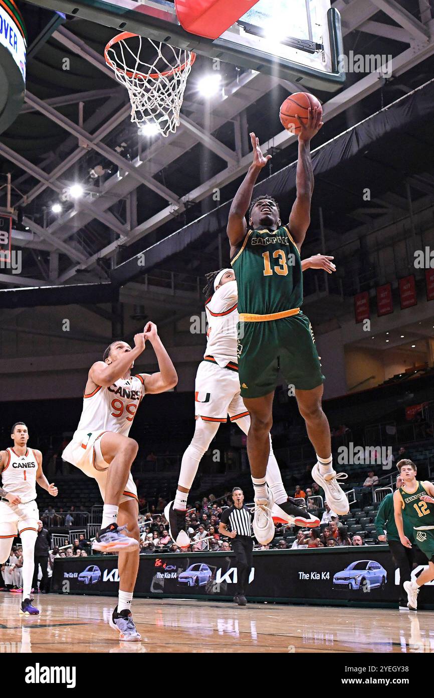 CORAL GABLES, FL - OCTOBER 30: St. Leo forward Jaylan McElroy (13) puts up a basket while ...