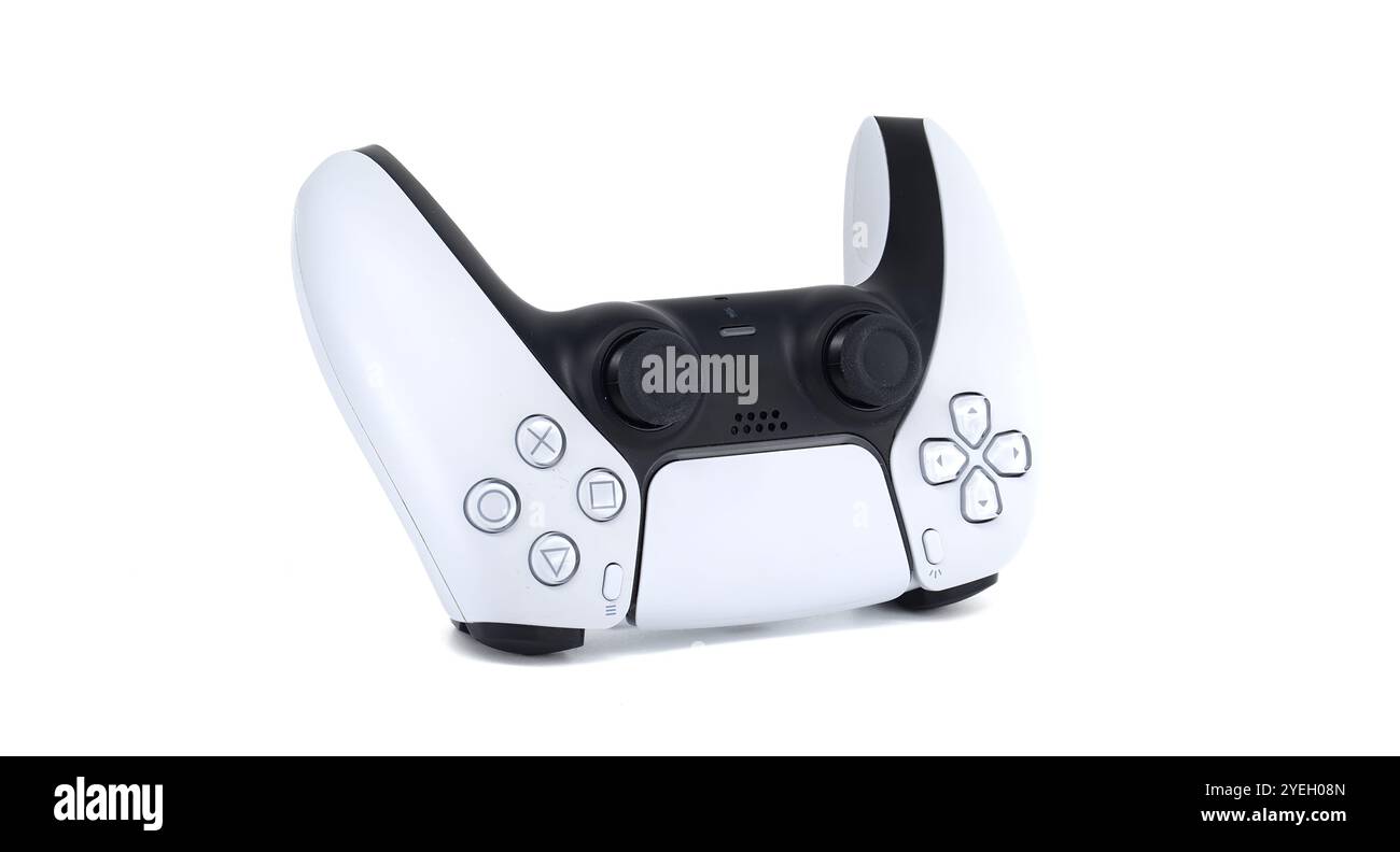 Close-up of a modern gaming controller with sleek white design and ...