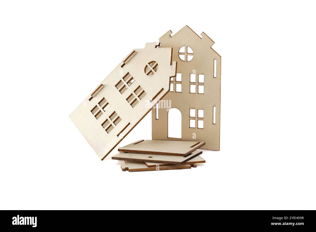 Wooden house model pieces elegantly arranged, highlighting the concept ...