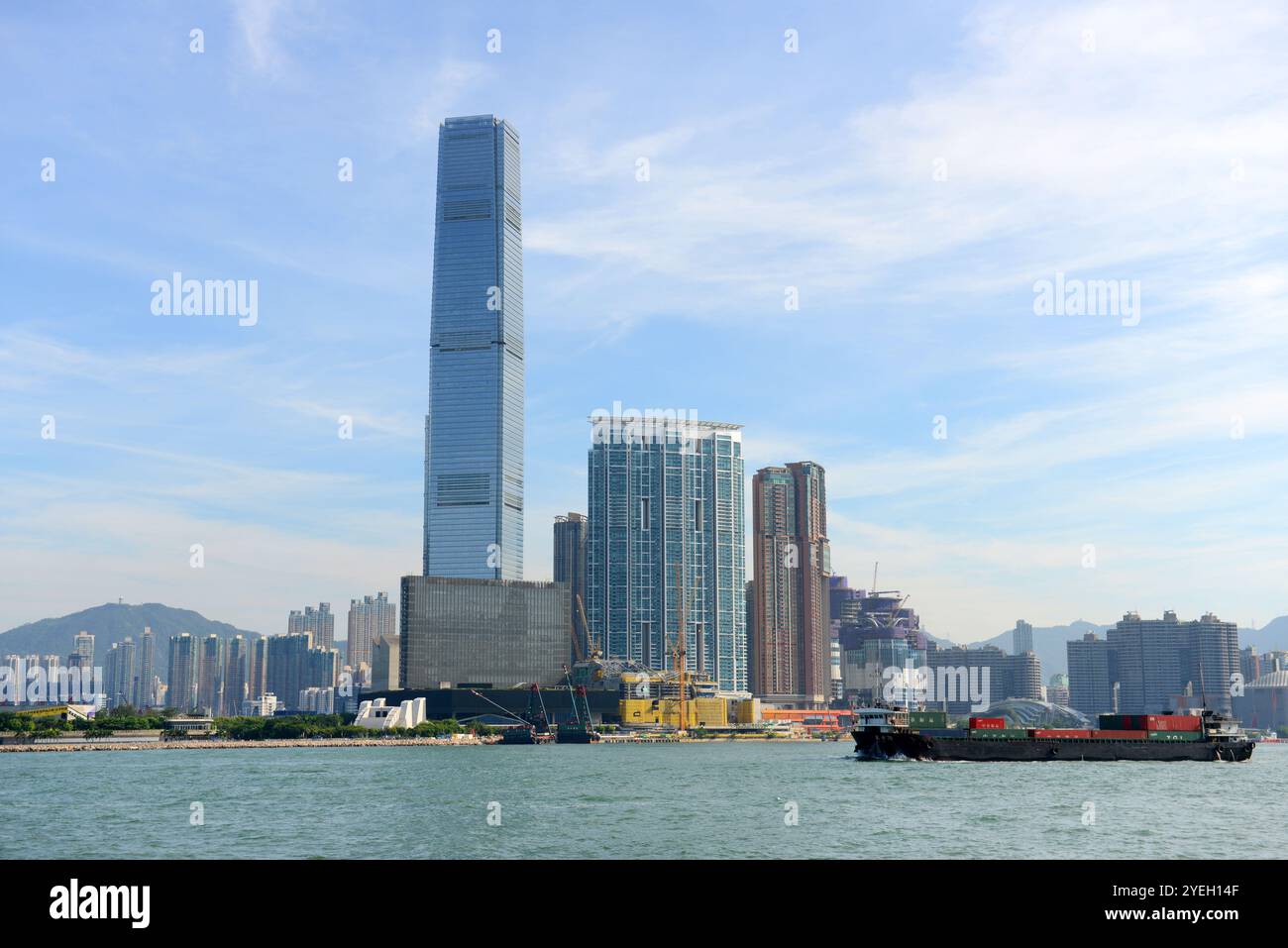 A small container ship crossing the Victoria Harbour in Hong Kong Stock ...