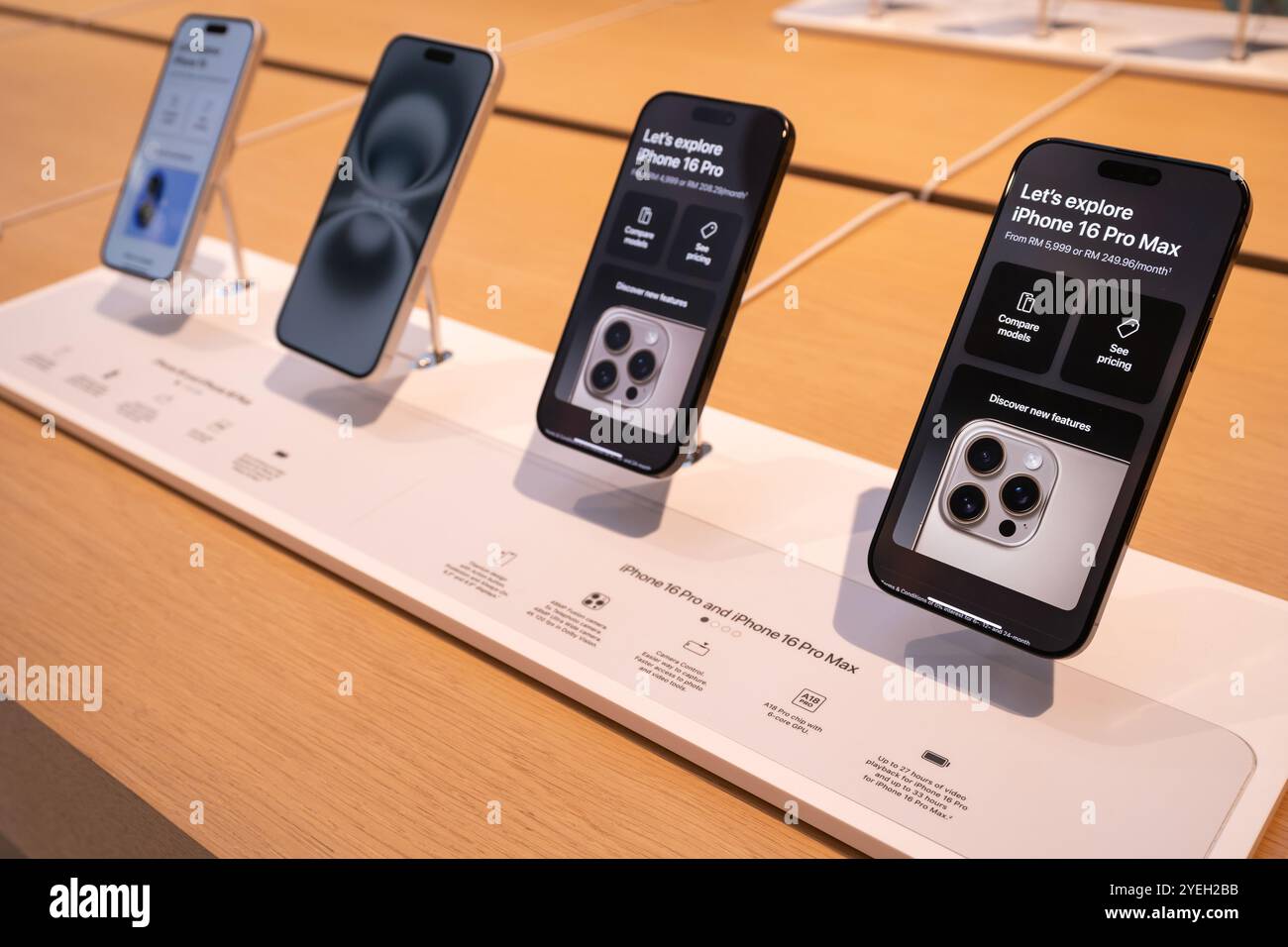 Kuala Lumpur, Malaysia - October 30, 2024 : Demo unit of the Iphone 16 displaying on the table ...