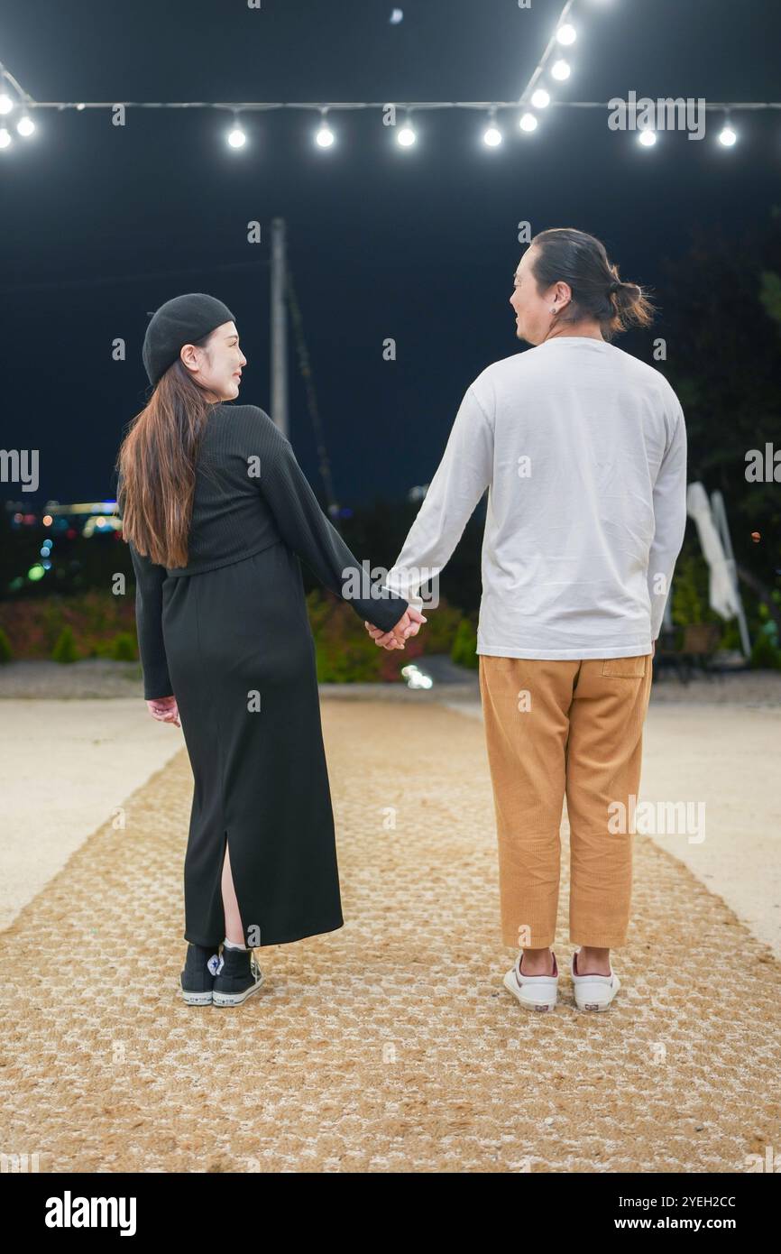 A Korean man and a Japanese woman, both in their 30s and a married ...