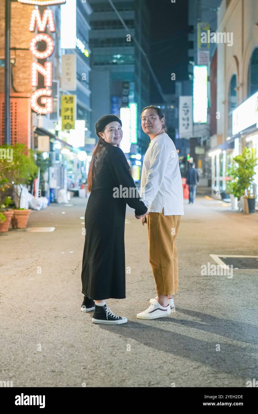 A Korean man and a Japanese woman, both in their 30s and a married ...