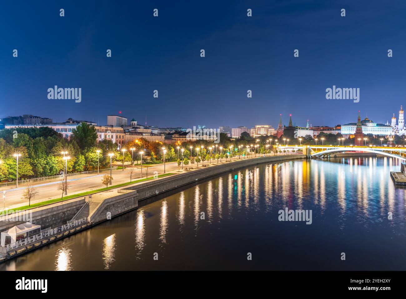 Illuminated Moscow Kremlin and Bolshoy Kamenny Bridge at summer night ...
