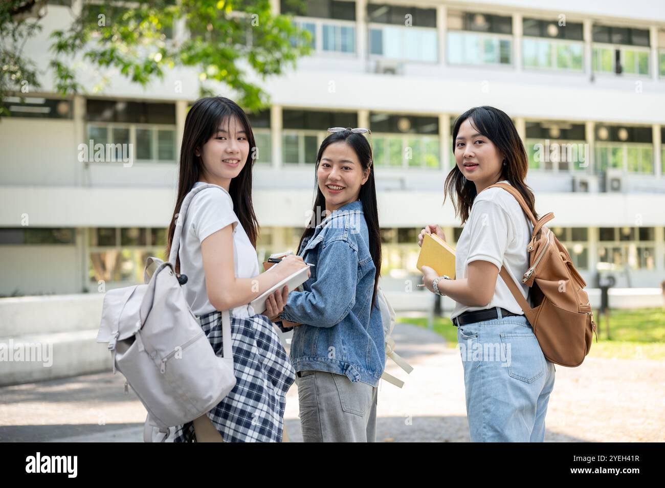 Smiling asian college students hi-res stock photography and images - Alamy