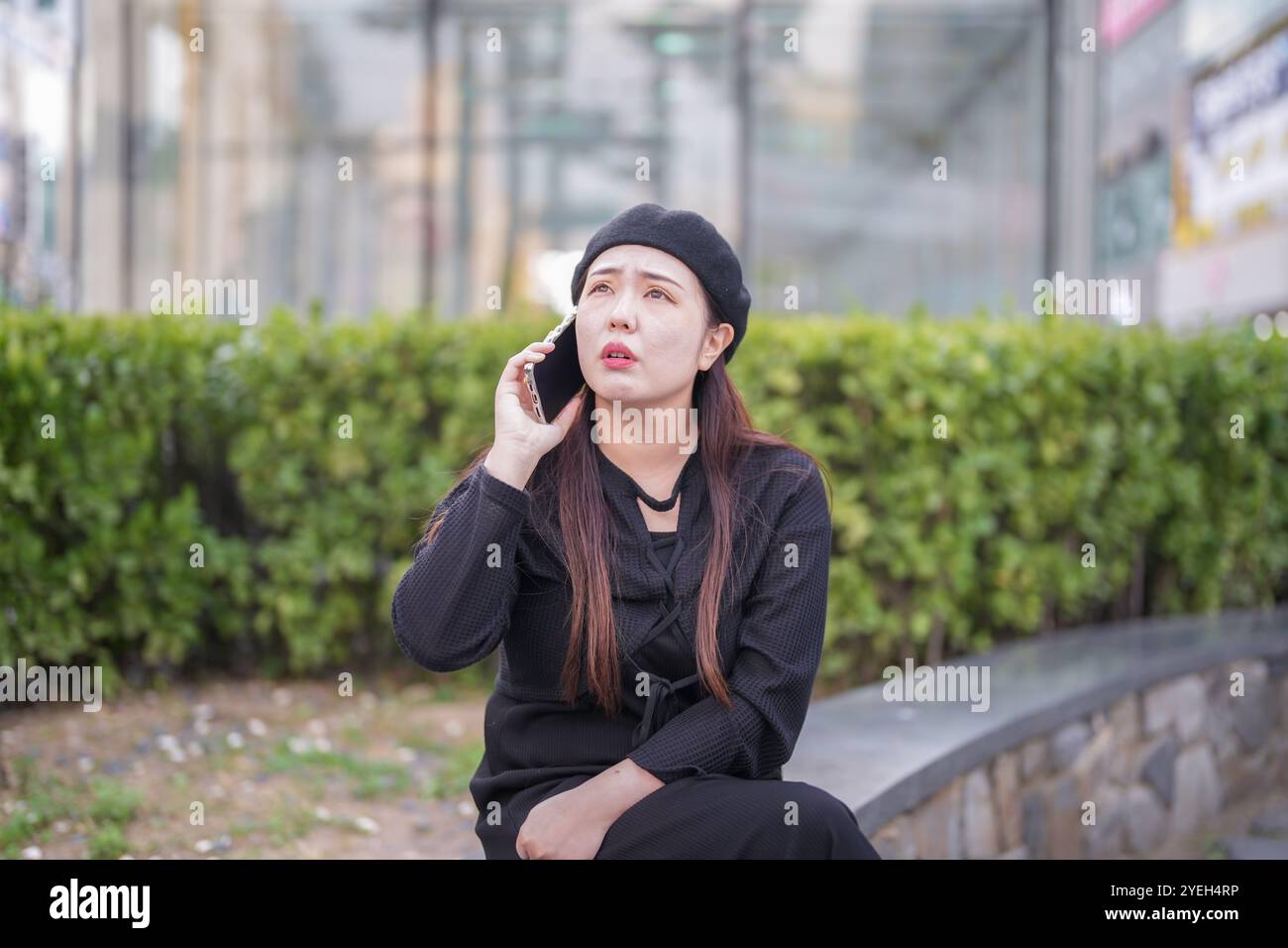 A Japanese woman in her 30s is enjoying a relaxing afternoon at a ...