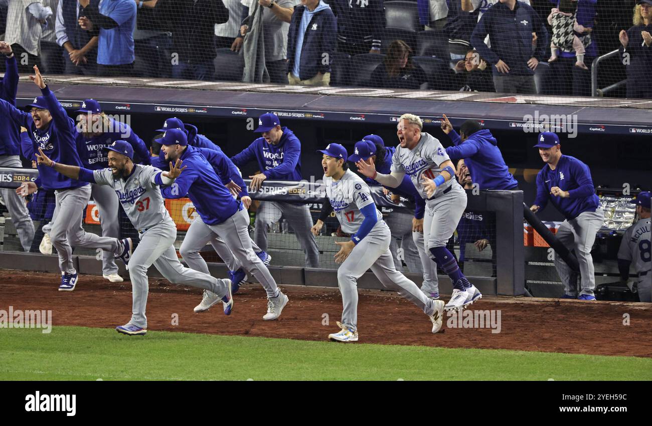 Los Angeles Dodgers players celebrate after clinching the MLB World Series with a 7-6 win over ...