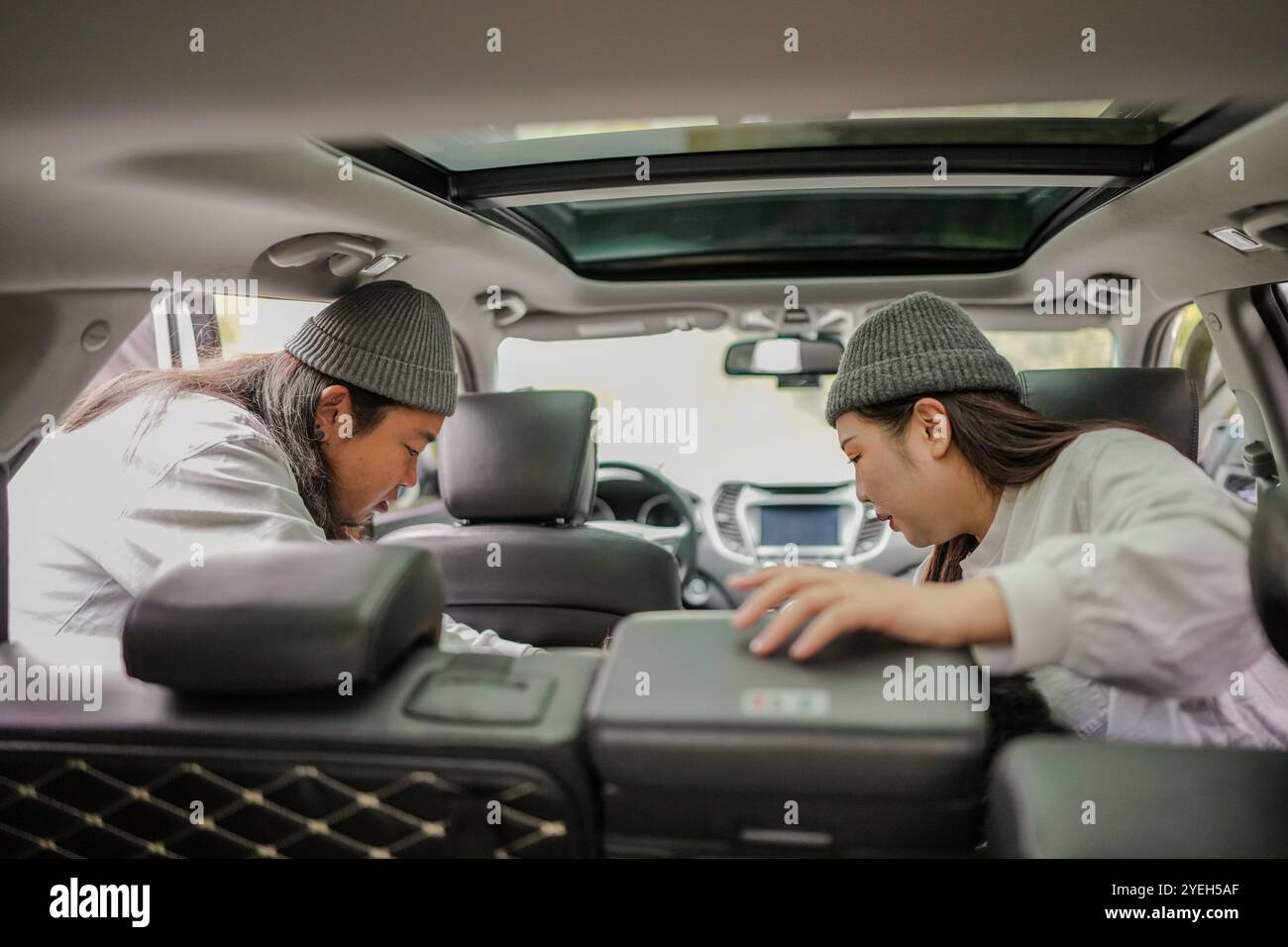 A Korean man in his 30s is driving a car in Pyeongnae-dong, Namyangju ...