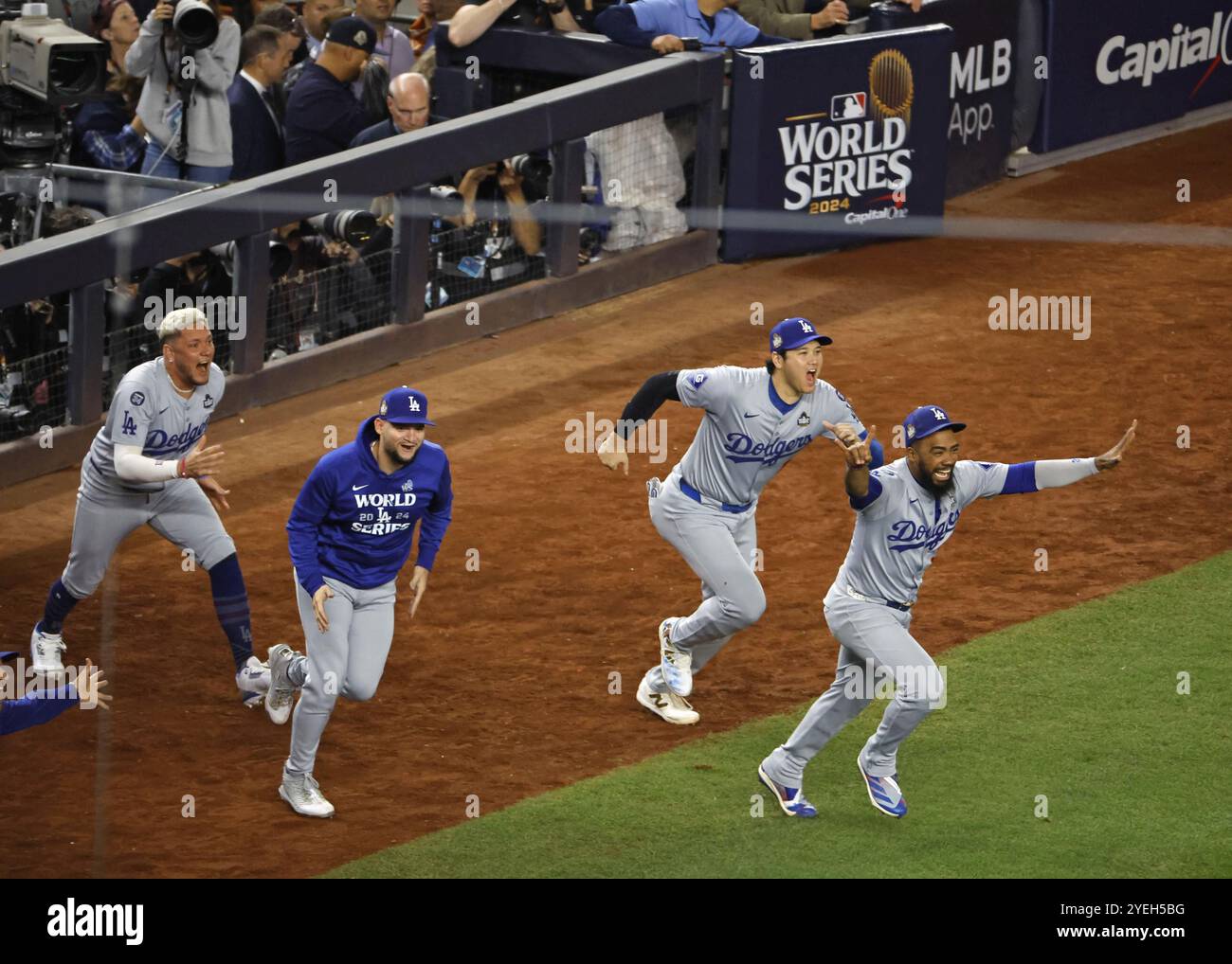 Los Angeles Dodgers players celebrate after clinching the MLB World Series with a 7-6 win over ...