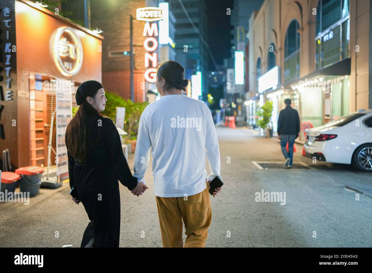 A Korean man and a Japanese woman, both in their 30s and a married ...