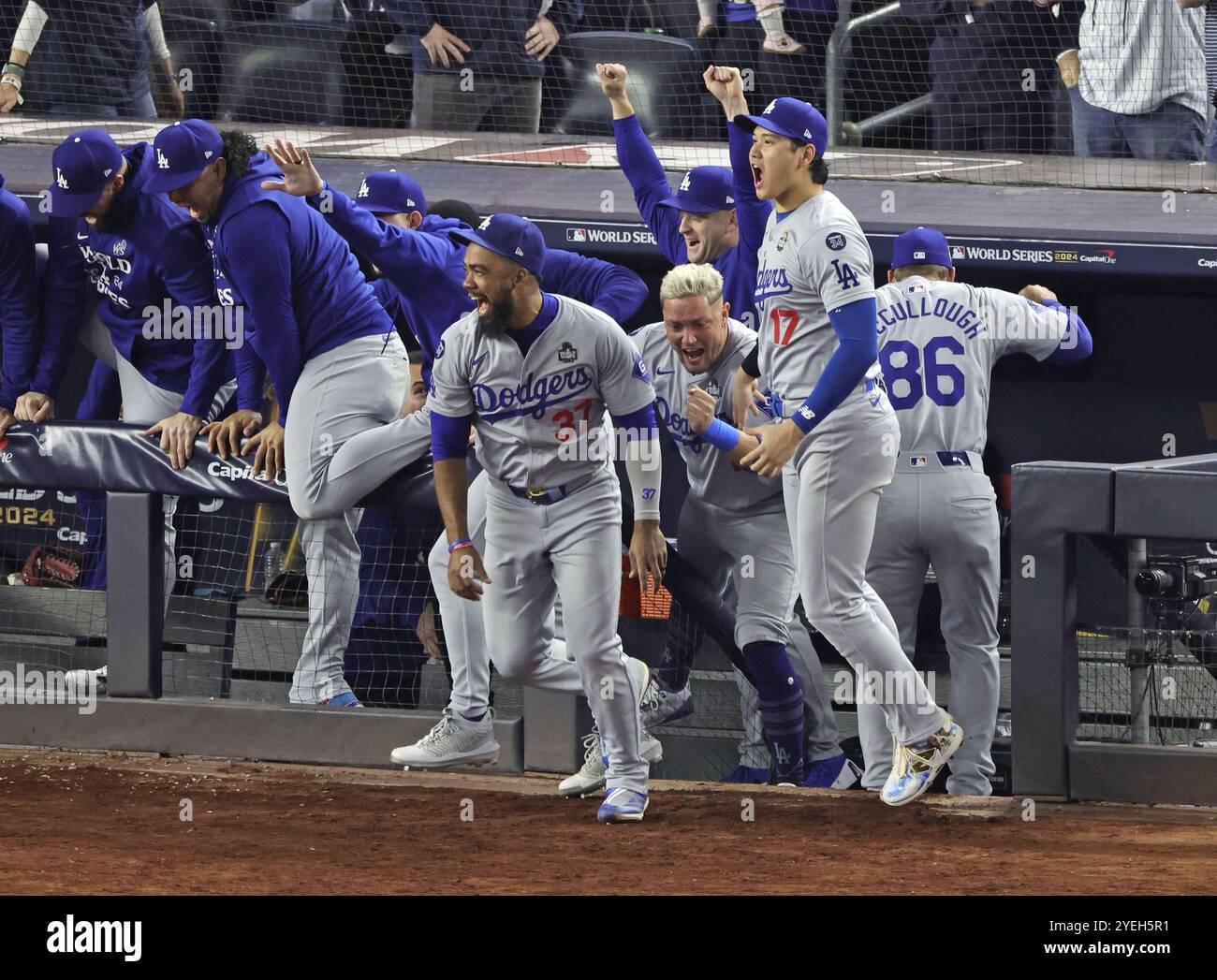 Los Angeles Dodgers players celebrate after clinching the MLB World ...