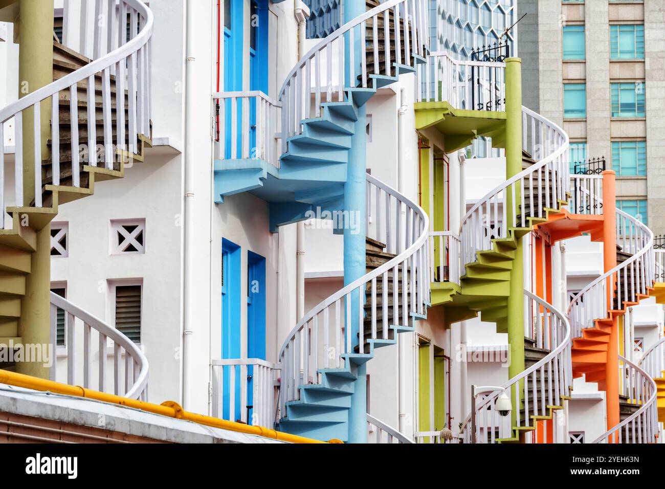 Colorful exterior spiral staircases in Singapore Stock Photo - Alamy