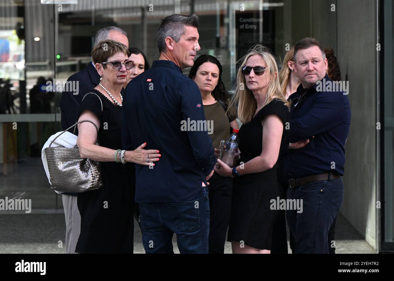 Brisbane, Australia. 31st Oct, 2024. Lee Lovell (centre), husband of ...