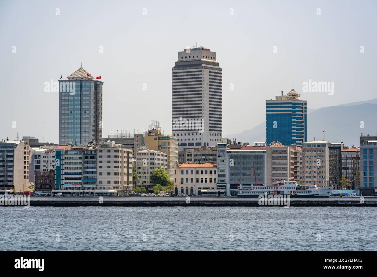 Izmir, Turkey - July 3, 2024: View of Kordon Street, ferry pier and ...