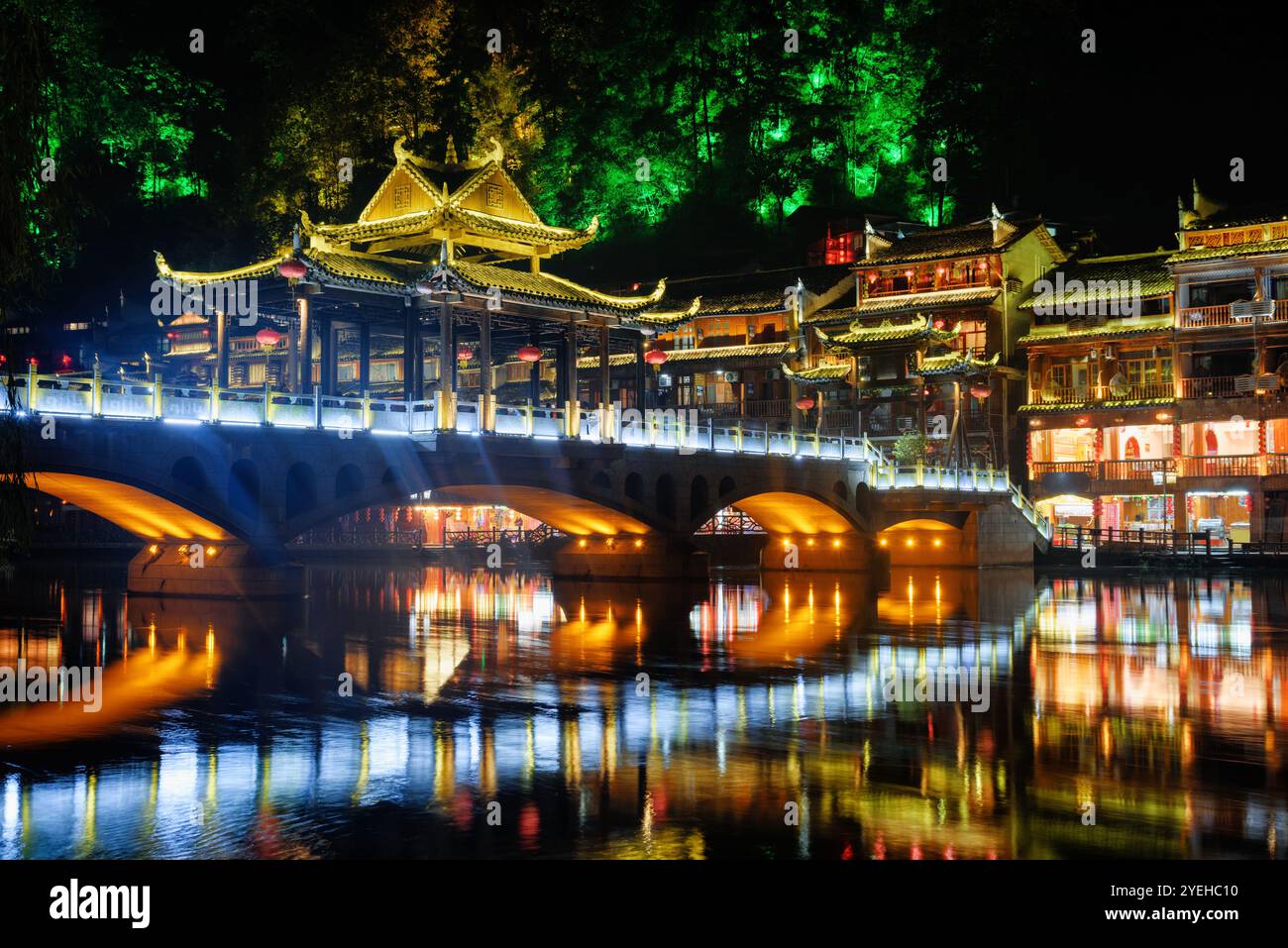 Amazing night view of colorful bridge in Phoenix Ancient Town Stock ...