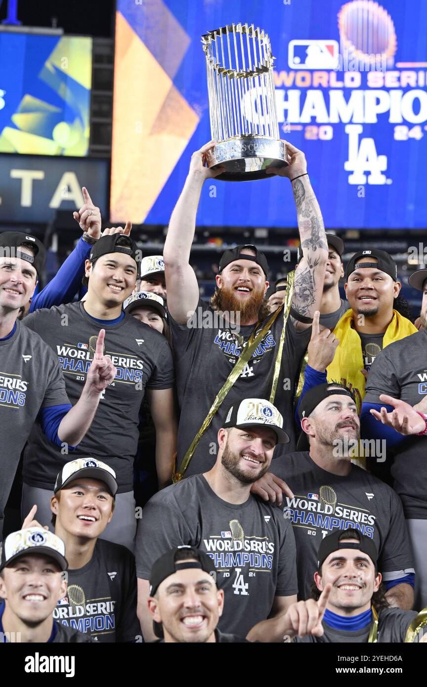 Los Angeles Dodgers players pose for a photo during a ceremony in the ...