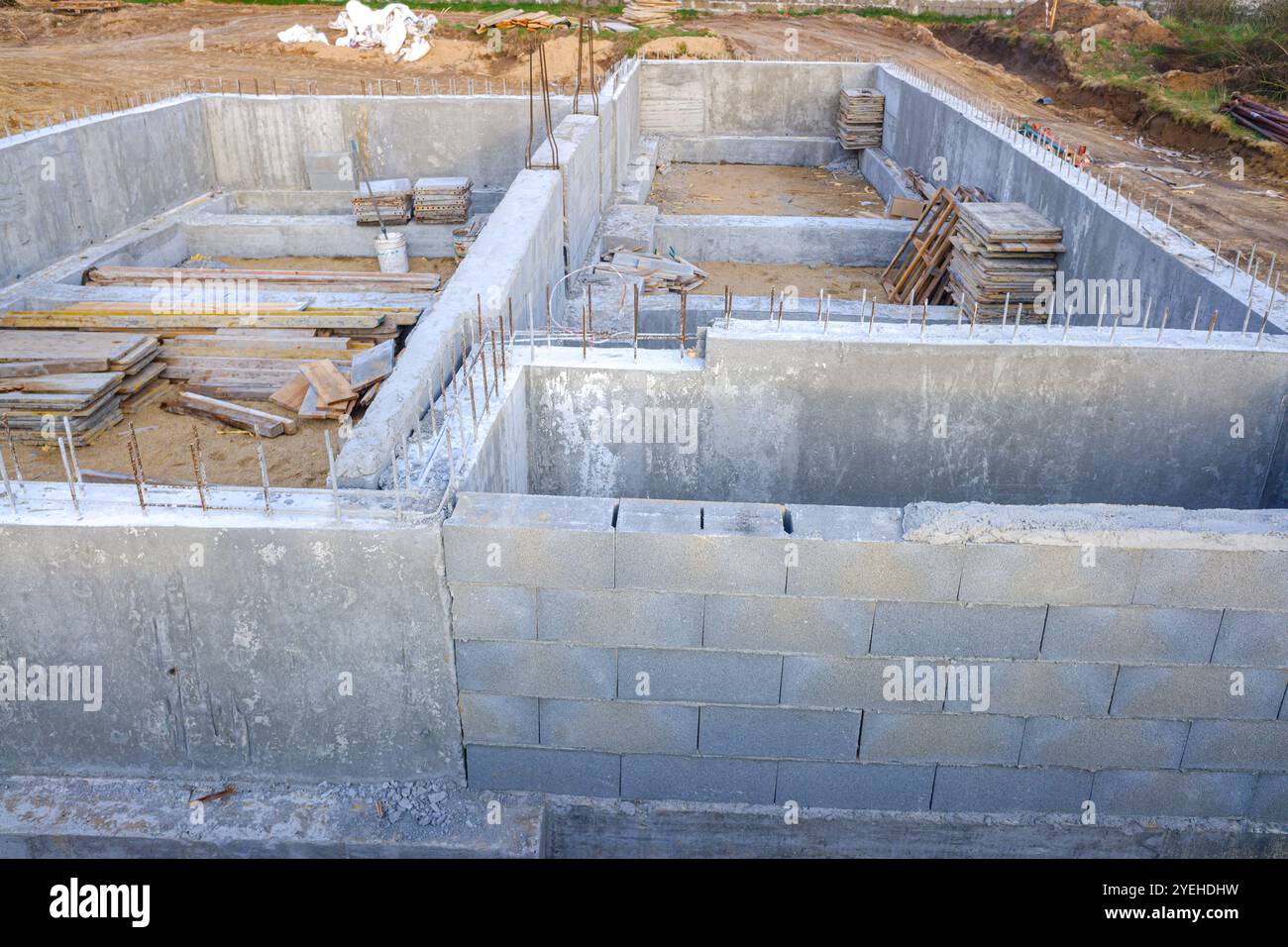 foundation made of cement blocks in a house under construction ...