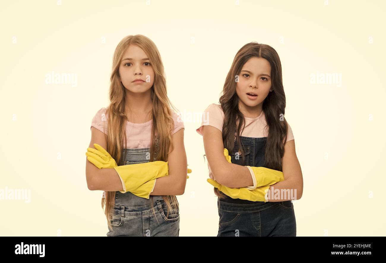 Domestic services. Adorable domestic helpers. Cute little girls wearing ...