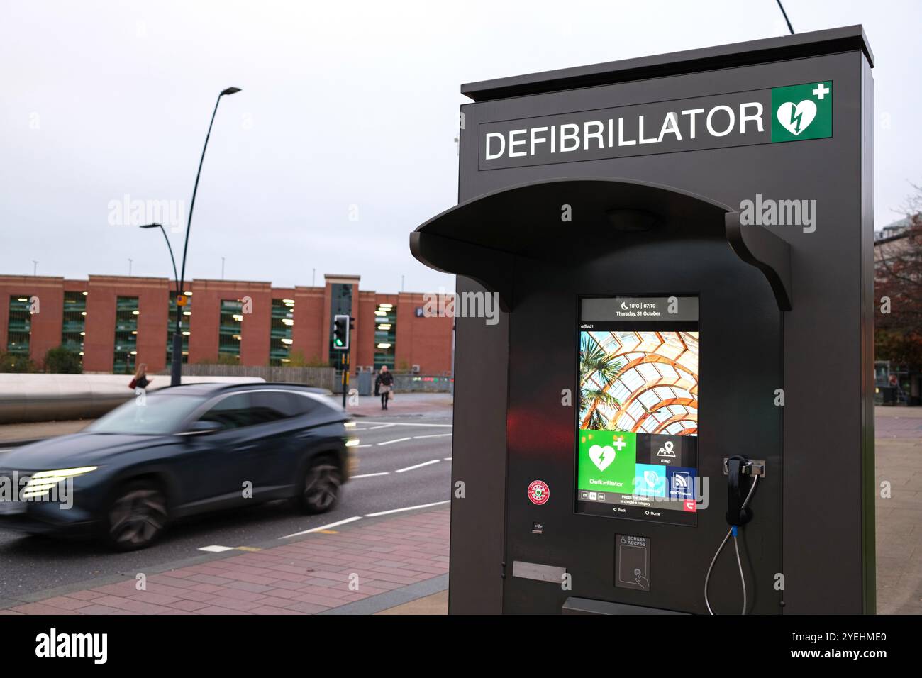 A car passes a roadside defibrillator in Sheffield, UK Stock Photo - Alamy